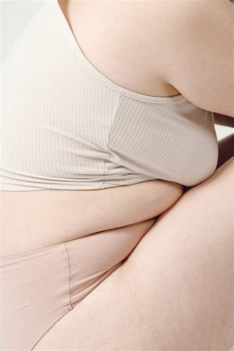 The Figure Of A Full Girl In Close Up A Positive Body Belly Legs And
