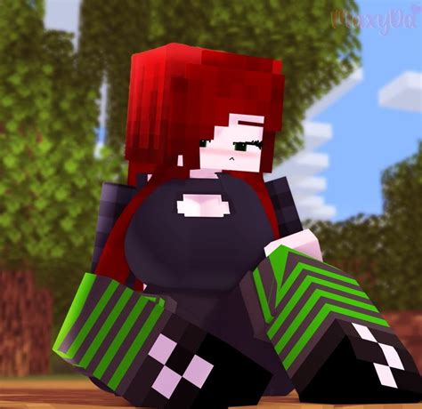 A Woman With Red Hair Sitting On The Ground In Front Of Some Trees And
