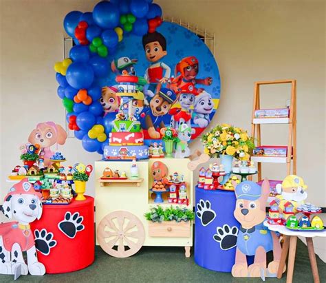 There Are Many Toys On Display At This Birthday Party