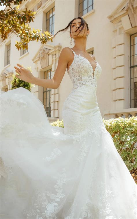 Glamorous Lace Fit And Flare Wedding Dress With Plunging Neckline