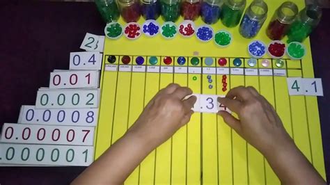 Tablero amarillo para trabajar los números decimales Matemáticas Nivel