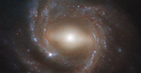 Hubble Captures Our Galactic Twin The Barred Spiral Galaxy Ngc