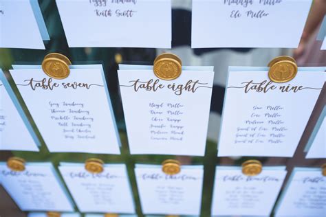 Wax Sealed Seating Charts On A Vintage Mirror Is The Perfect Way To