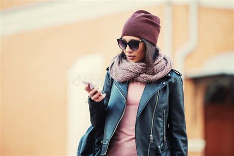 Young Fashion Woman In Black Leather Jacket Using Cell Phone In City Street Stock Image Image