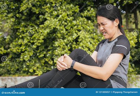 Woman Suffering From Pain In Leg Injury After Sport Exercise Running