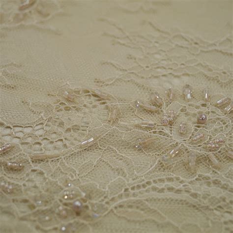 Tissu tulle brodé perlé sable Tissus en Ligne