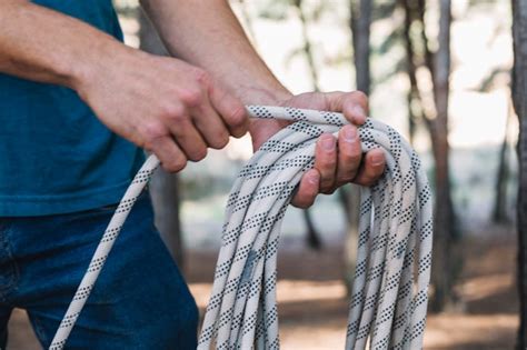 Free Photo Crop Person Wrapping Rope