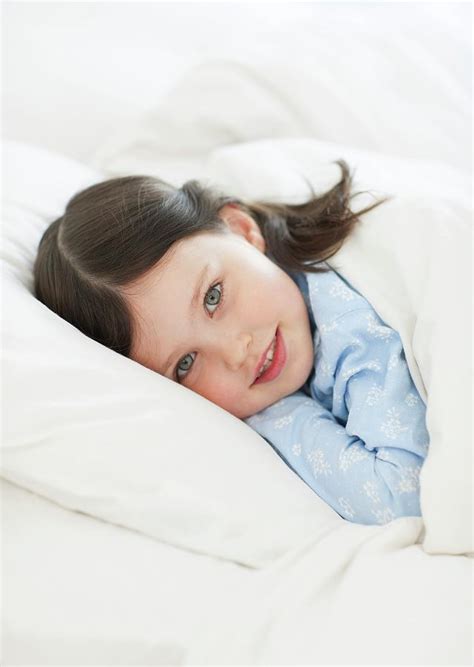 Girl Lying In Bed Photograph By Ian Hooton Pixels