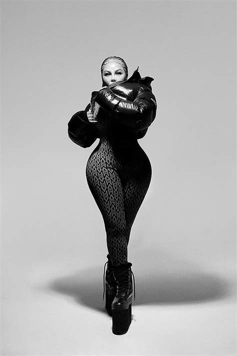 Lil Kim Stuns In Skintight Catsuit For Sexy New Mackage Campaign
