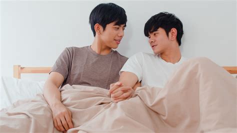 Free Photo Handsome Asian Gay Couple Talking On Bed At Home Young Asian Lgbtq Guy Happy