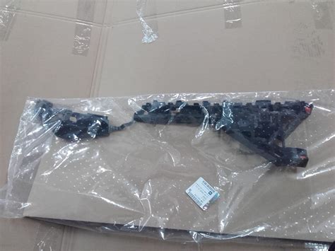 Opel Oe Ślizg Wspornik Zderzaka Tył Sedan Astra J 20877798 20877797