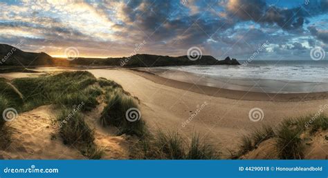 Beautiful Summer Sunrise Landscape Over Yellow Sandy Beach Stock Photo