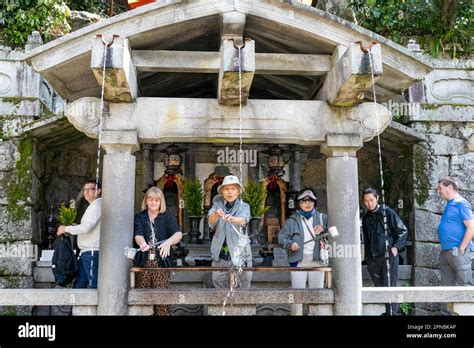 April 2023 Kiyomizu Dera Temple In Kyoto People Drinking From The