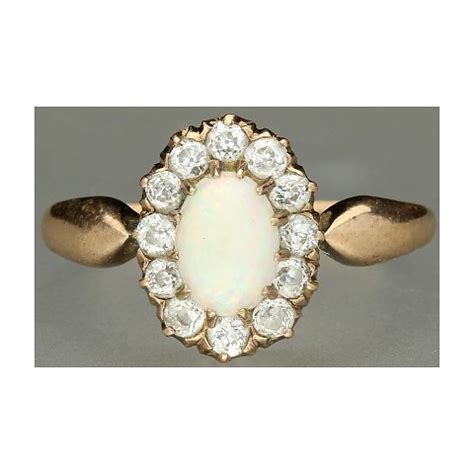 Ring Af Guld 14kt Fattet Med Opal Og Brillanter Ialt Ca 0 24ct Ebuy Dk