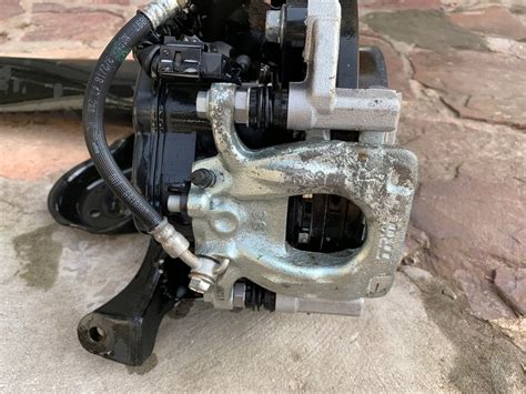 NISSAN QASHQAI J11 ZACISK HAMULCOWY PRAWY TYŁ 8964520358 oficjalne