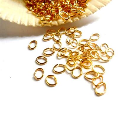 100 Gold Plated Oval Jump Rings 5mm Open Loop 8 12 Etsy