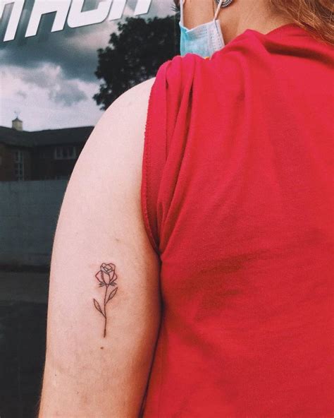 Minimalistic Rose Tattoo Hand Poked On The Tricep