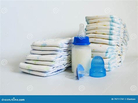 Stacks Of Diapers Stacked In Staggered Rows On A White Background Stock