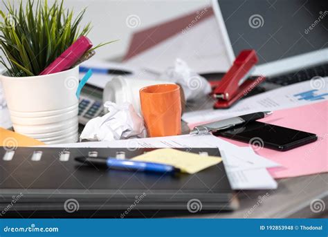 Messy And Cluttered Desk Stock Photo Image Of Paper 192853948