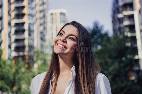 Photo Of Cute Positive Person Beaming Smile Look Curious Away Far