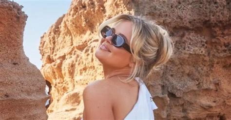 Emily Atack Has Fans Swooning In Plunging Black Dress That Clings To