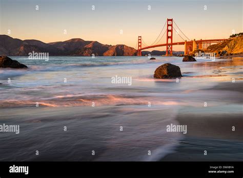Golden Gate Suspension Bridge Seen From Baker Beach At Sunset San