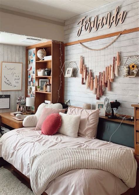 A Bed Sitting In A Bedroom Next To A Wooden Shelf Filled With Books And