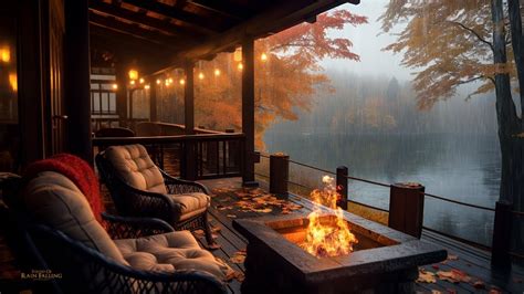 Autumn Cozy Lake House Porch In Rainy Morning With Bonfire And Fall