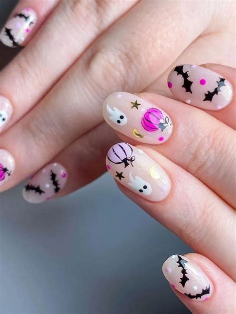 Ghost Nails Spooky Cute Designs And Ideas Cute Halloween Nails