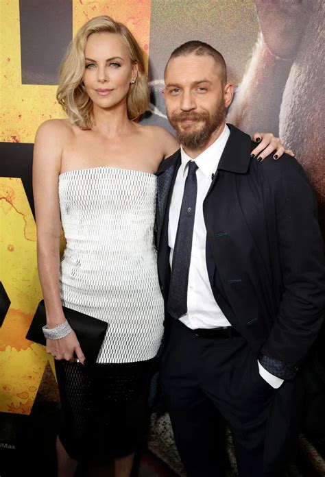 Tom Hardy Charlize Theron Look Back On Their Mad Max Feud Tom Hardy