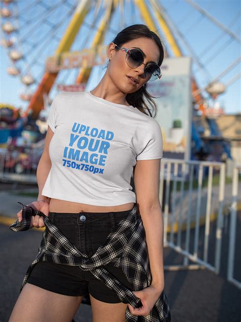 Woman Wearing A Crop Top T Shirt Mockup At An Amusement Park