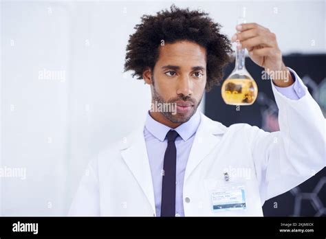 Chemistry Is Cool A Handsome Male Scientist Conducting An Experiment