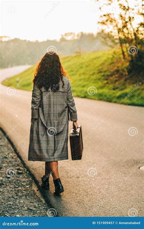 Old Woman Walking Away