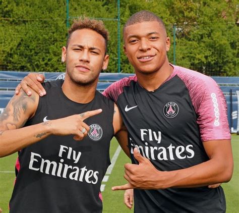 Kylian Mbappe And Neymar Jr Of Paris Saint Germain Look On Before The