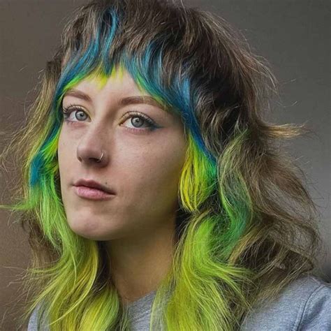 15 Best Shaggy Wolf Cuts With Bangs HairAide