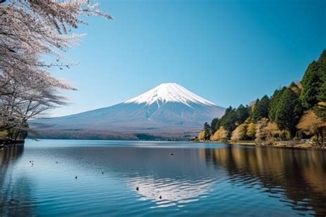 Premium AI Image Mt Fuji And Cherry Blossom At Kawaguchiko Lake In