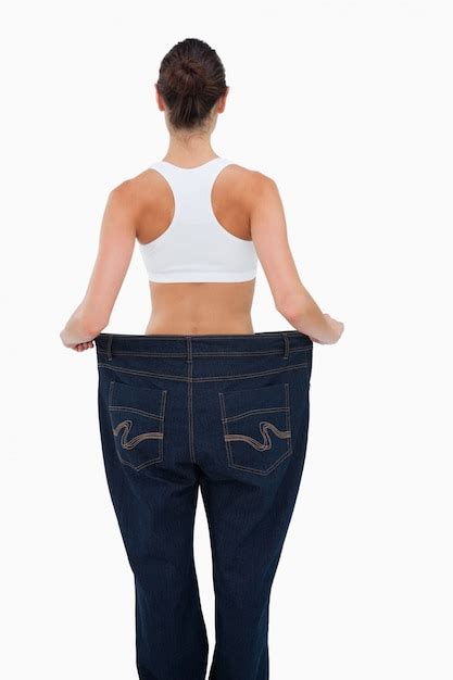 Premium Photo Rear View Of A Woman Who Lost A Lot Of Weight