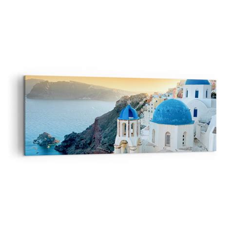 Obraz na płótnie Santorini przytulone do skał 140x50 cm Obraz