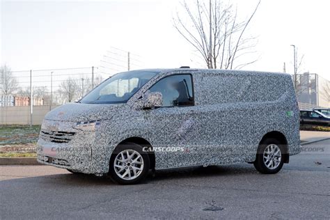 Vw Transporter T Spied In Ev Form With A Double Cab Flatbed Body