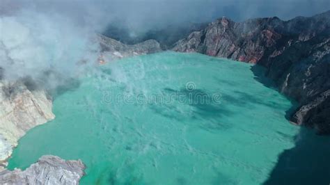 Drone Shot Of The Beautiful Acidic Crater Lake In Mount Ijen Stock