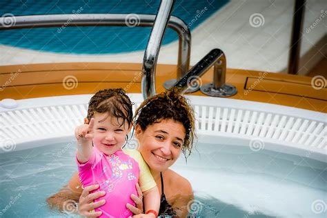 Beautiful Young Girl And Her Mom Having Fun In A Jacuzzi Stock Image Image Of Water Beautiful