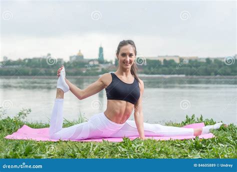 Fit Woman Doing Splits On Mat In Nature Stretching Her Legs Stock Image Image Of Leisure