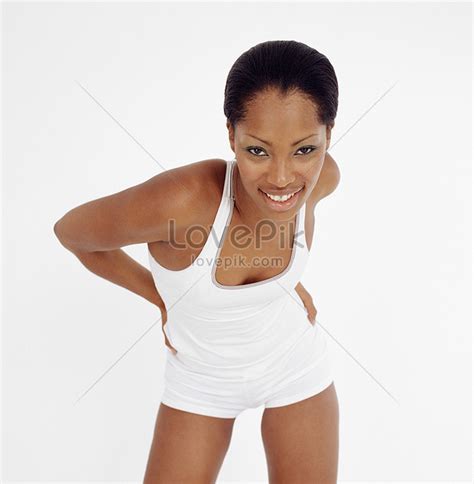 Young Woman Leaning Forward With Hands On Hips Picture And Hd Photos Free Download On Lovepik