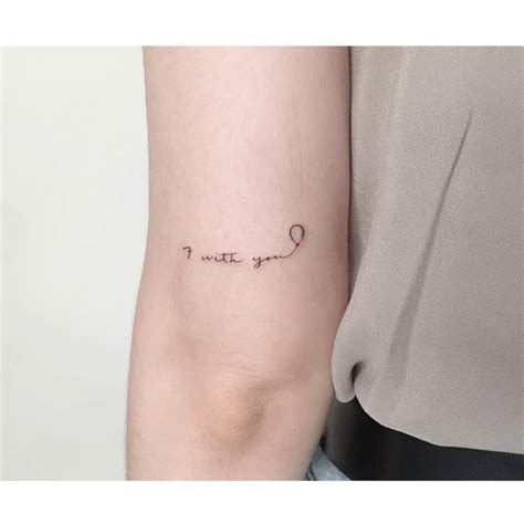 7 With You Lettering Tattoo Located On The Tricep