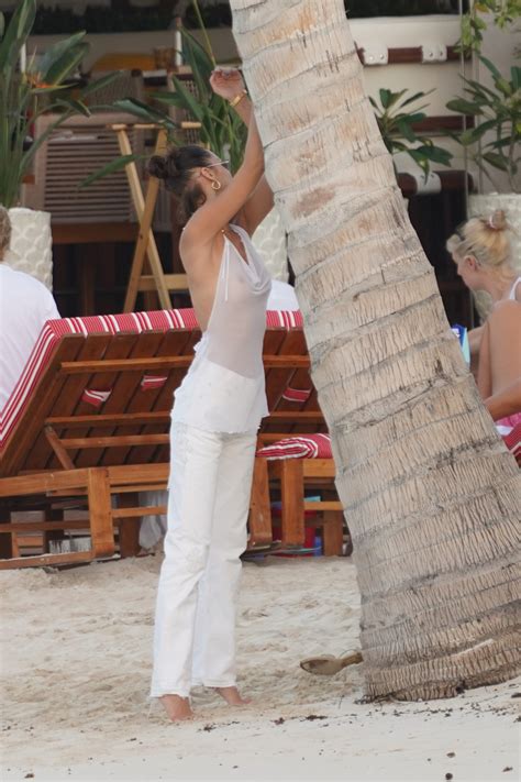 Bella Hadid Sexy Braless Boobs In A See Through Top In St Barts