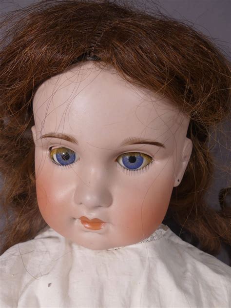 Poupée tête porcelaine marquée en creux SFBJ Paris 27 R Taille 15