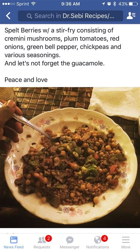 Someone Is Holding A Spoon Over A Plate Of Food