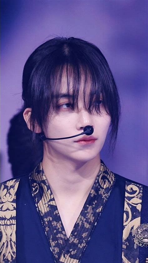 A Man With A Nose Ring On Top Of His Head