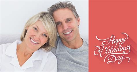 Premium Photo Cheerful Couple In Bed Against Happy Valentines Day