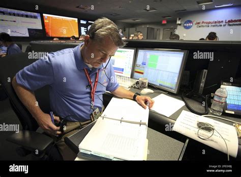 MSL Flight Director Keith Comeaux Works Inside The Spaceflight